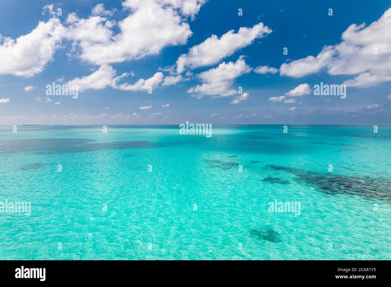 Perfect sky and water of Indian ocean. Turquoise lagoon with coral reef ...