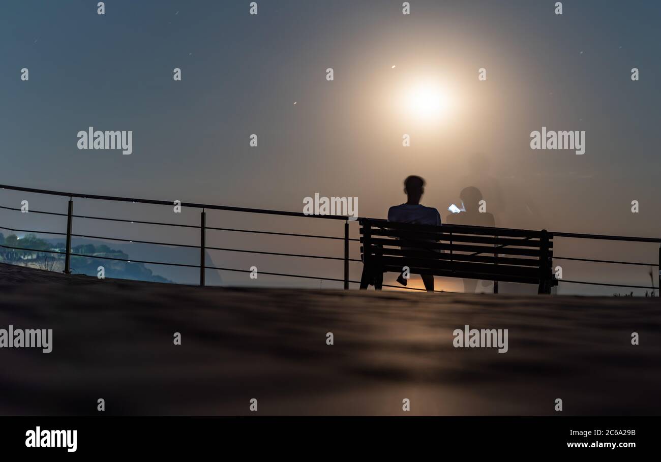 Love couple in moonlight hi-res stock photography and images - Alamy