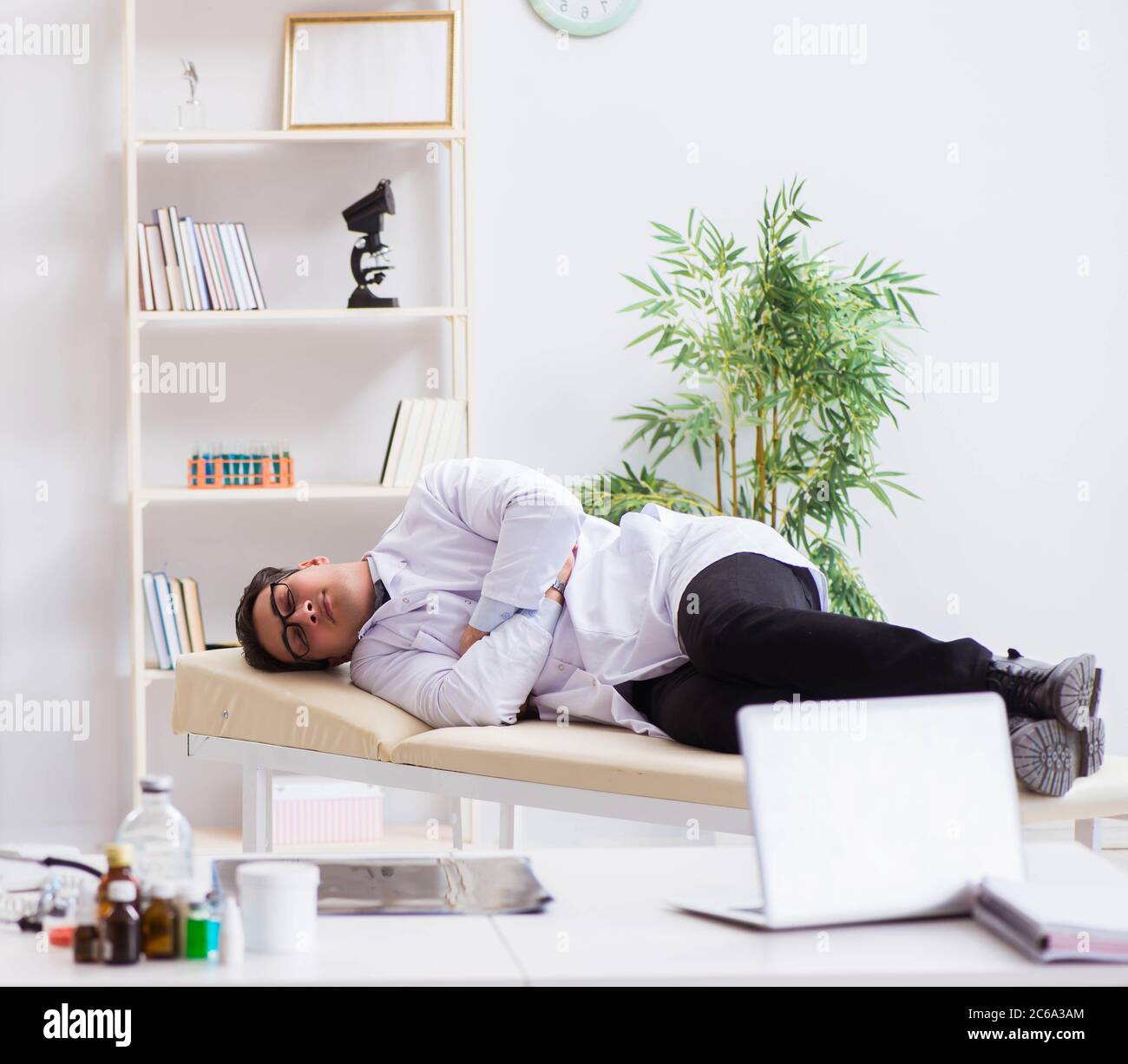 The doctor relaxing after complex surgery in hospital Stock Photo - Alamy