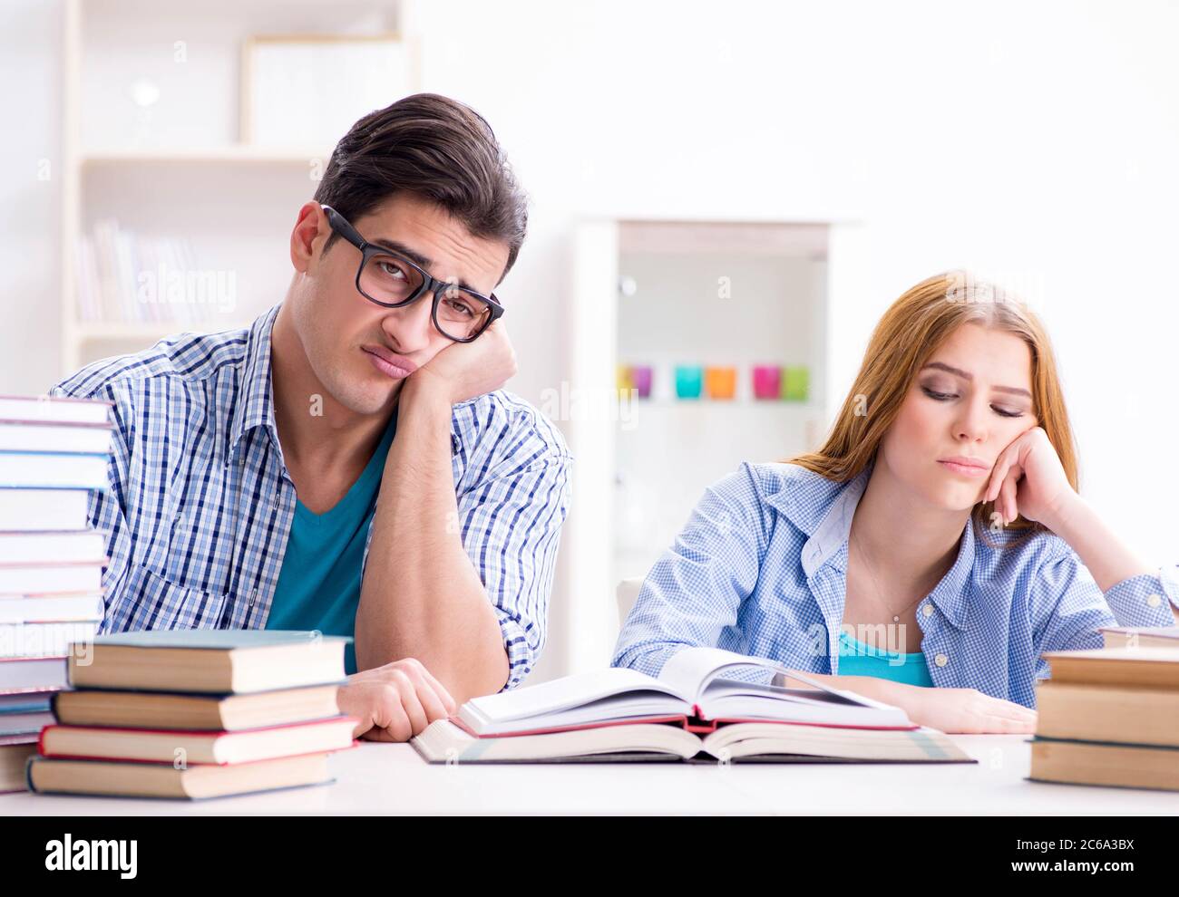 The pair of students studying for university exams Stock Photo - Alamy