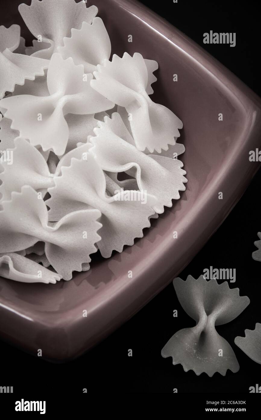 Shaped pasta and plain pasta. Pasta with different shapes with ...