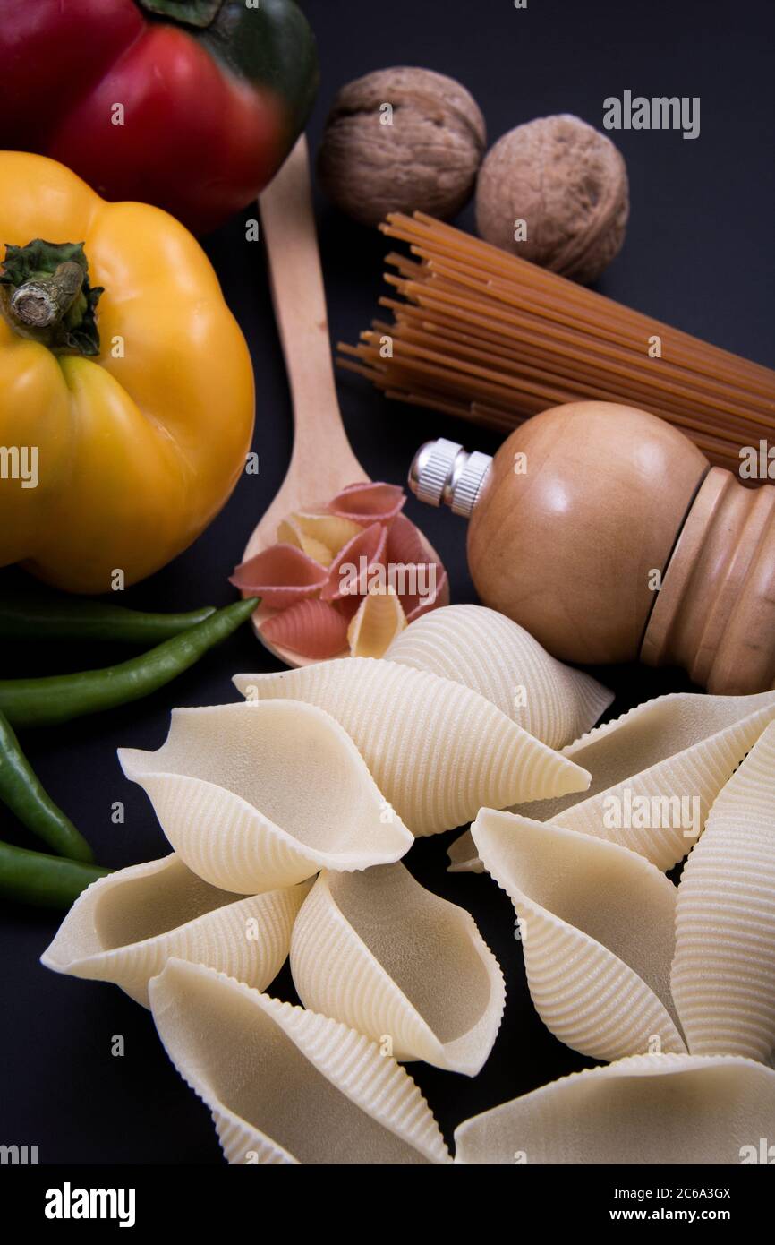 Shaped pasta and plain pasta. Pasta with different shapes with ...