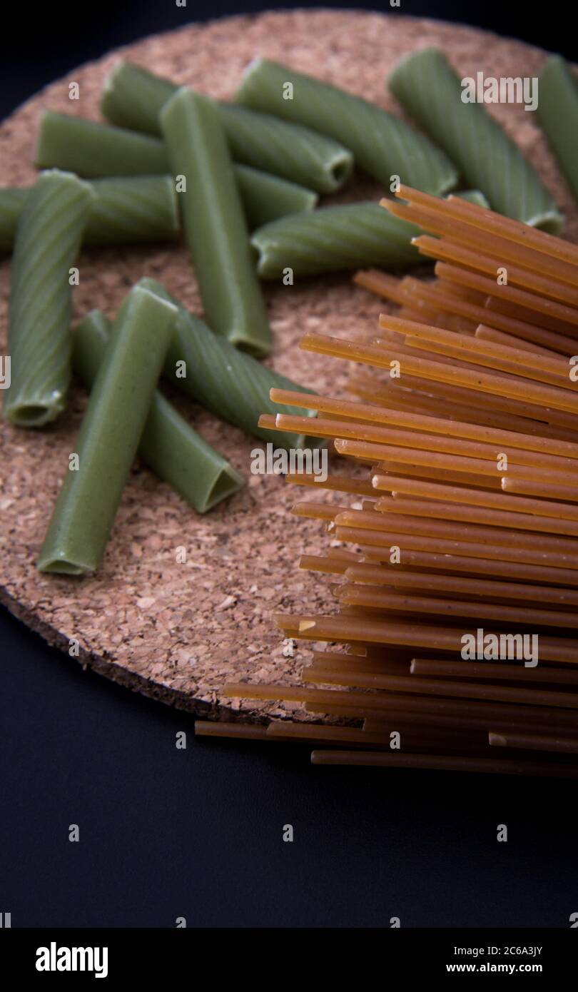 Long brown pasta. Pack of brown pasta with macaroni shape and Colorful ...