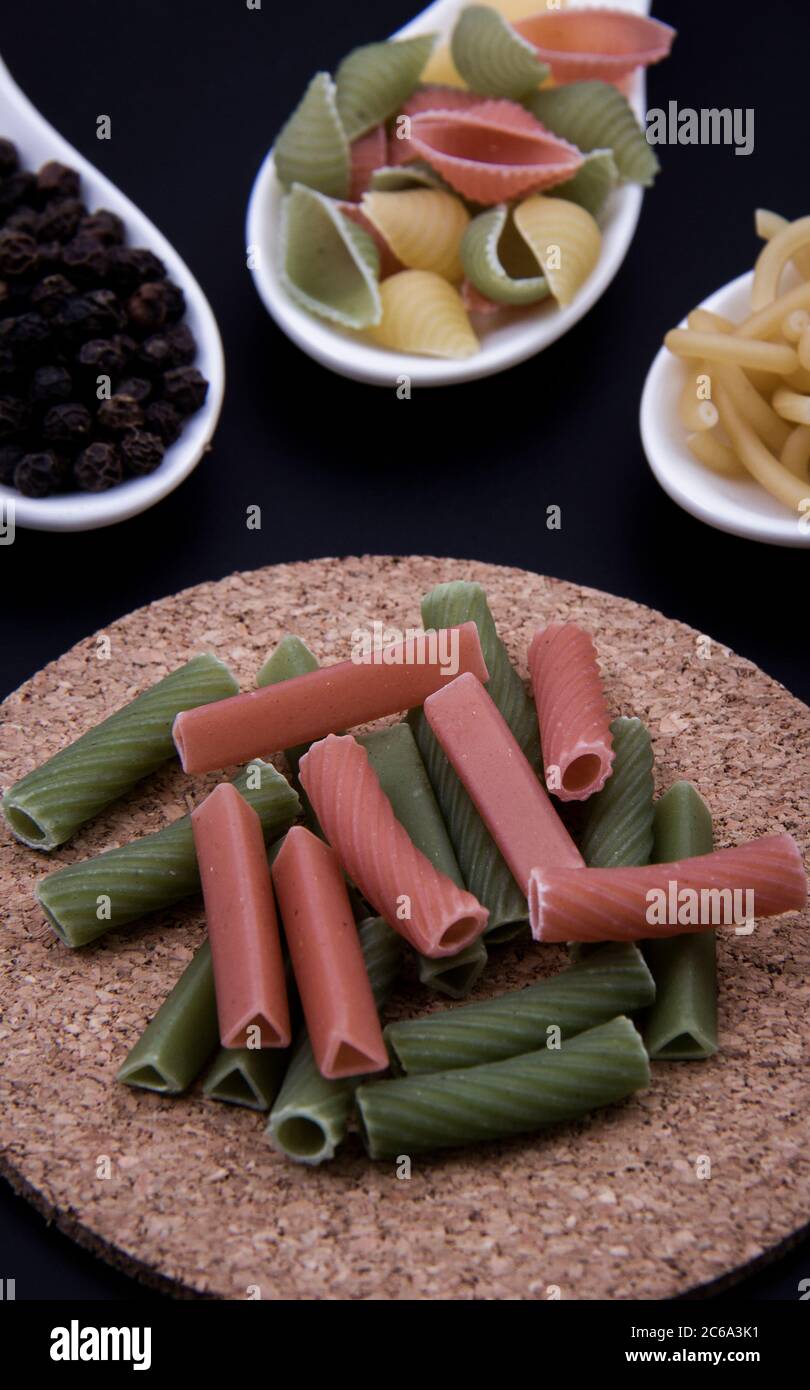 Shaped pasta and plain pasta. Pasta with different shapes with ...