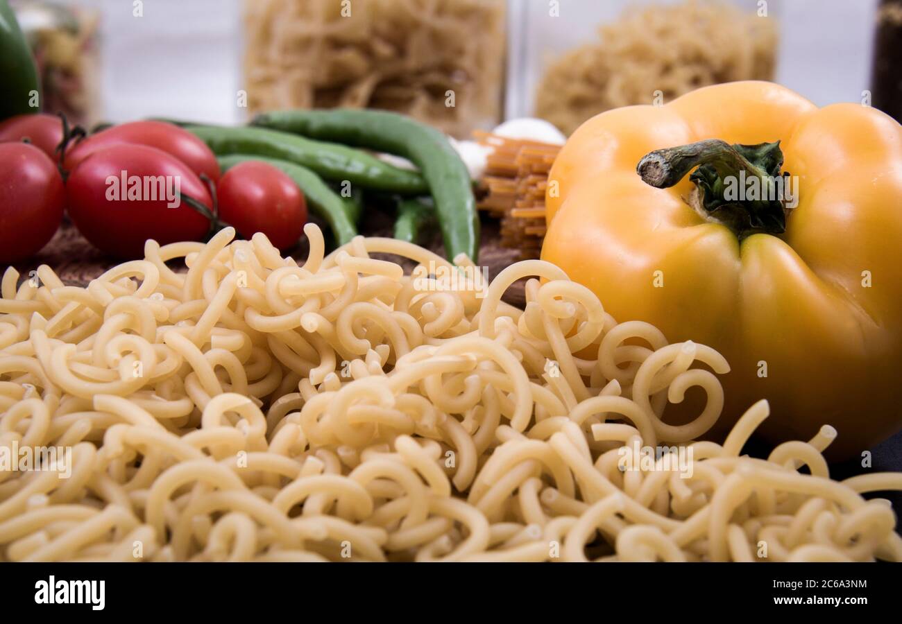 Shaped pasta and plain pasta. Pasta with different shapes with ...