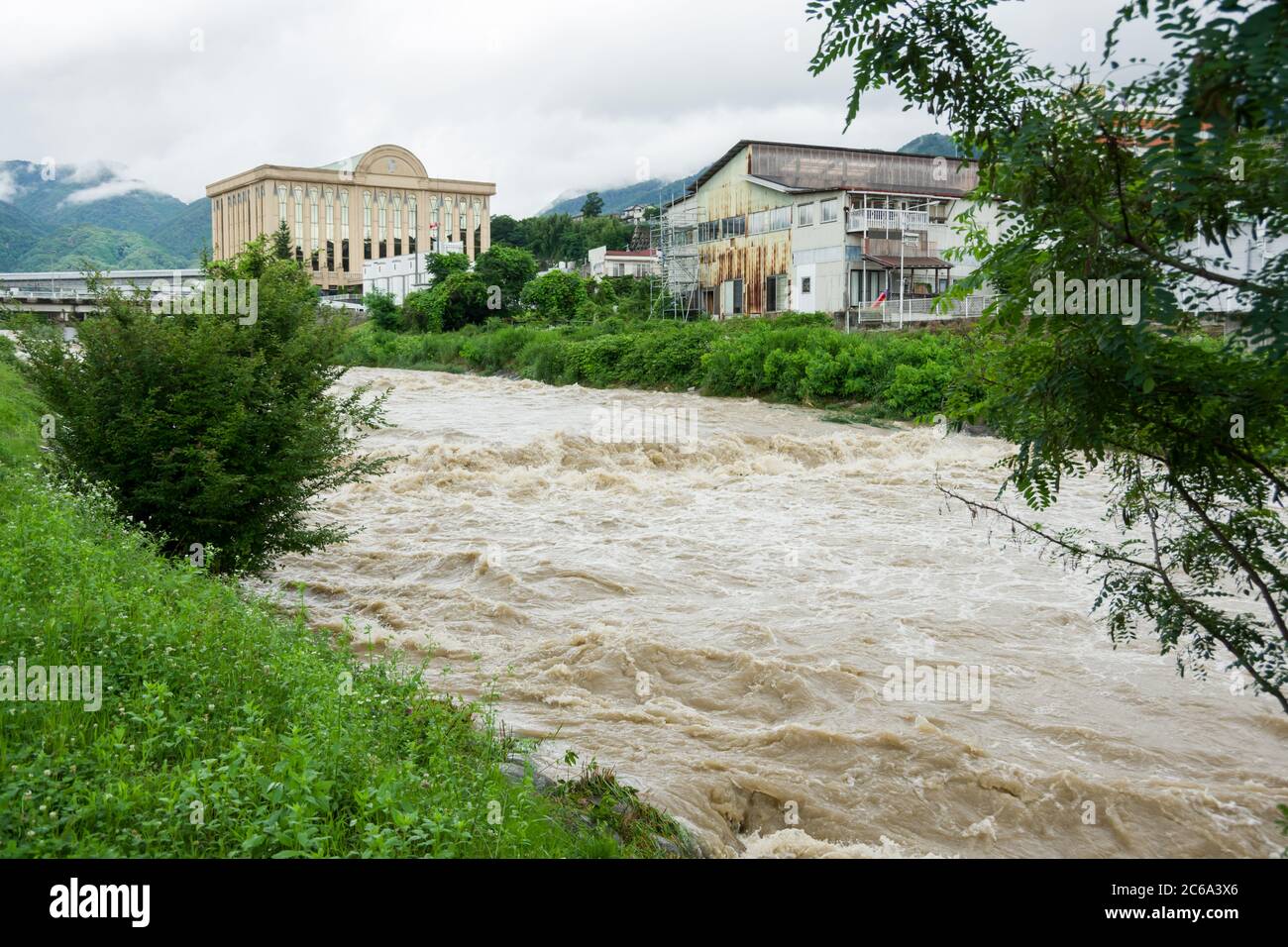 Iida, Nagano, Japan, 07/08/2020, Tenryu river after heavy rain in Iida ...