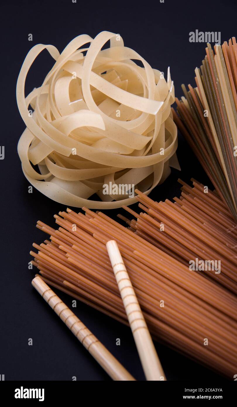 Long brown pasta. Pack of brown pasta with macaroni shape and Colorful ...