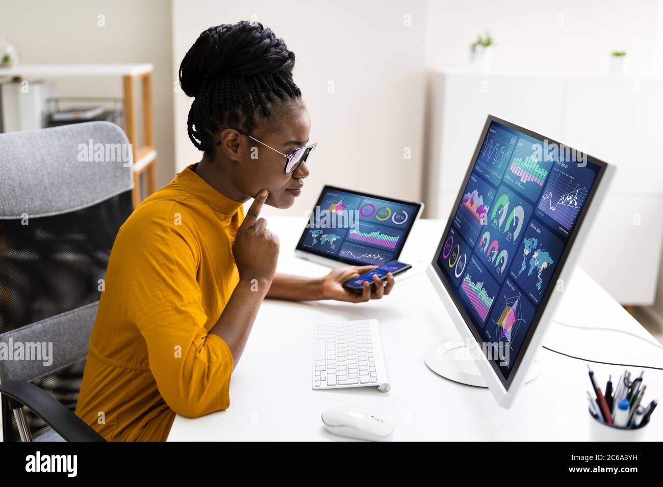 African American Business Data Analyst Woman Using Computer Stock Photo ...