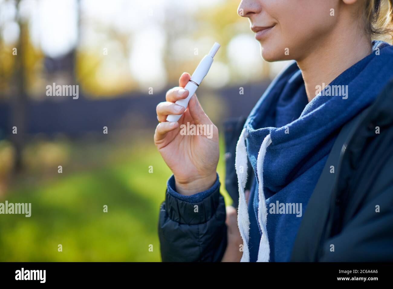 Side view young woman smoking hi-res stock photography and images - Alamy