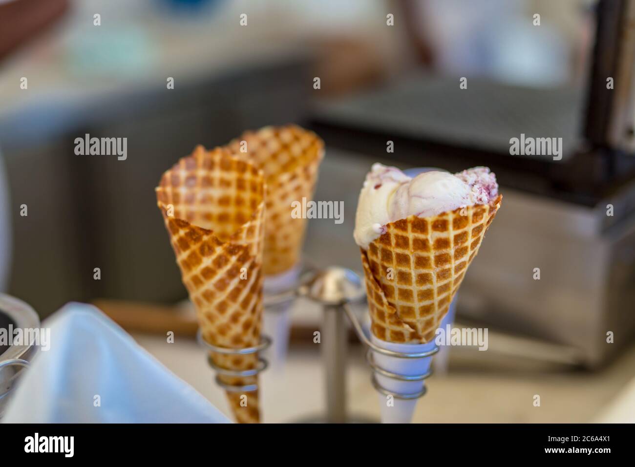 Ice cream waffles, hand made ice cream cones in shop Stock Photo - Alamy