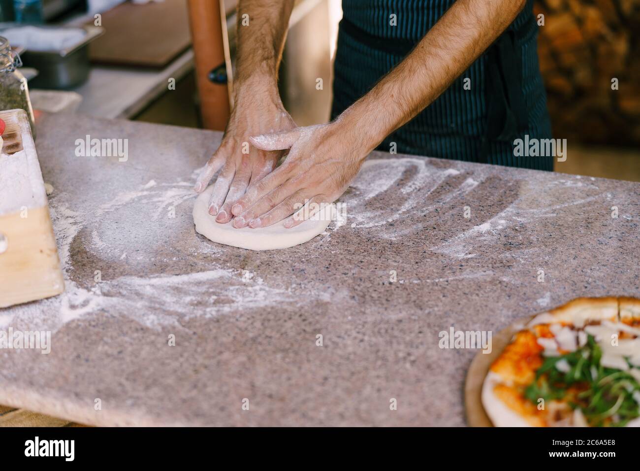 Chef rolls dough hands pizza hi-res stock photography and images - Alamy