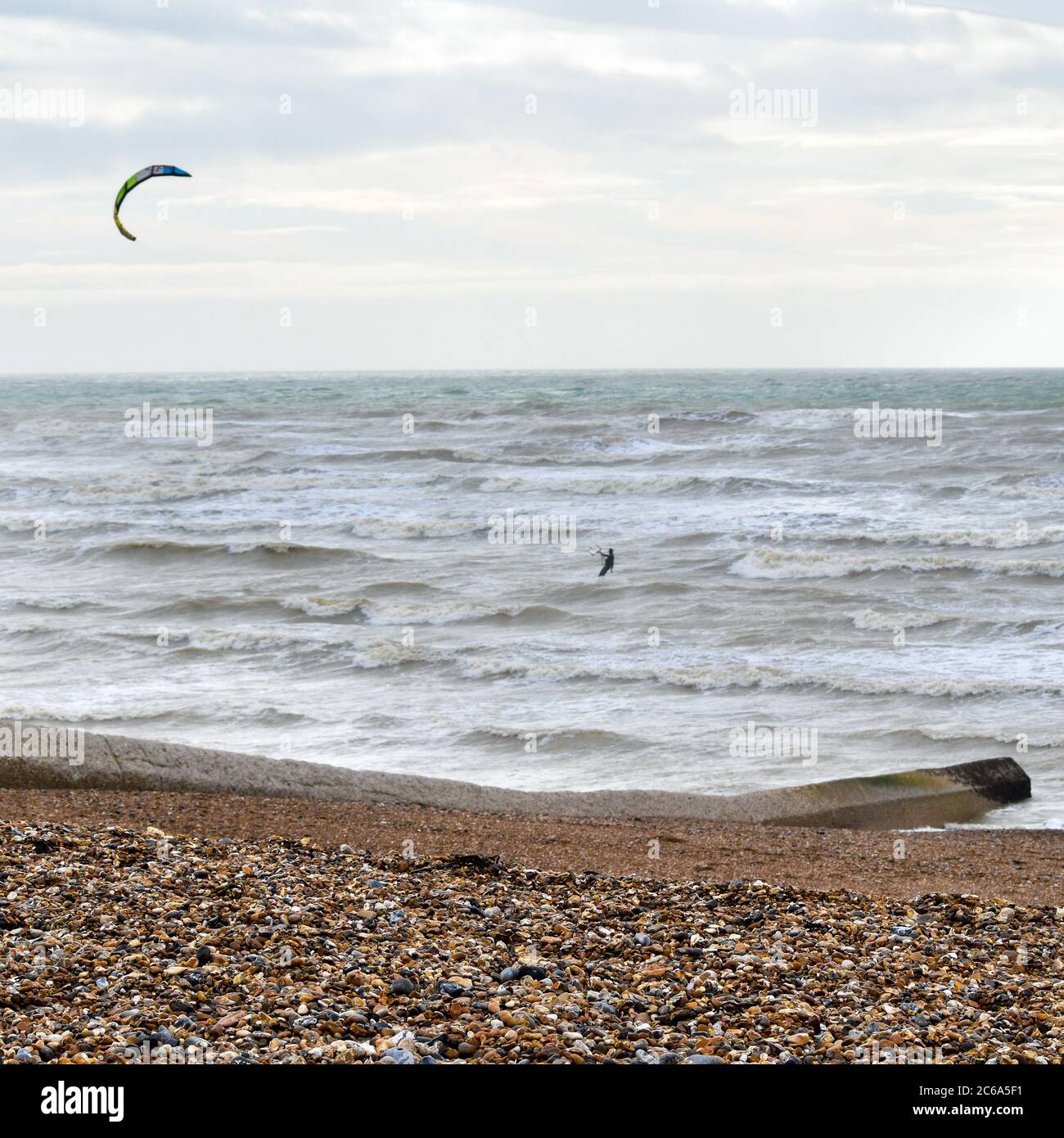 Kiteboard and kite surfer at the beach hi-res stock photography and ...