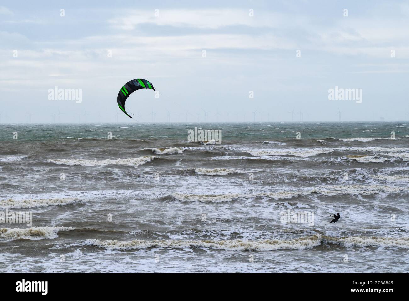 Kite surfer jumping waves Stock Photo - Alamy