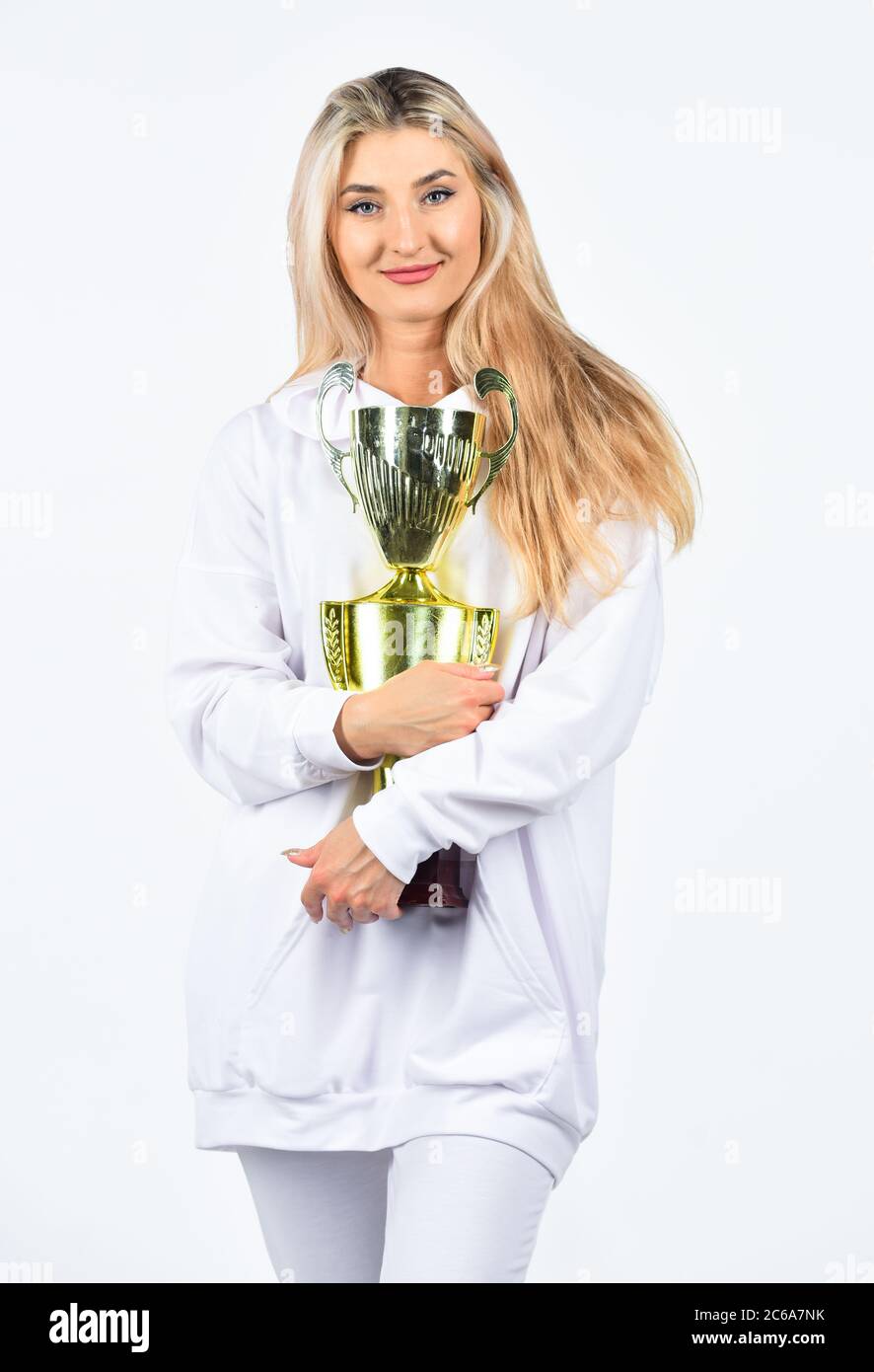 Girl showing winning trophy hi-res stock photography and images - Alamy