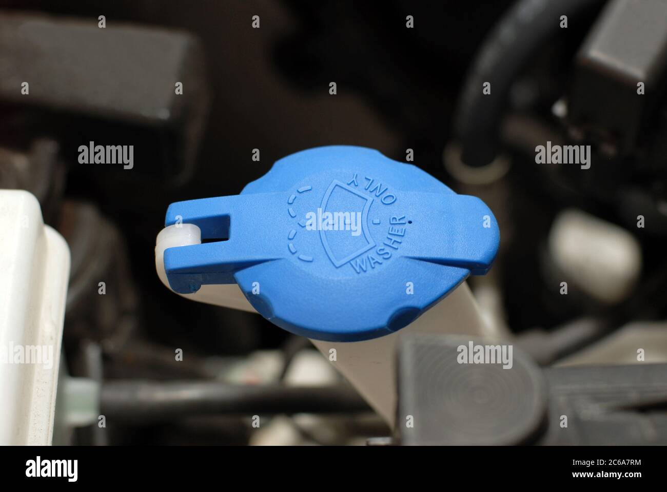 cap of container for the windshield washer fluid Stock Photo - Alamy