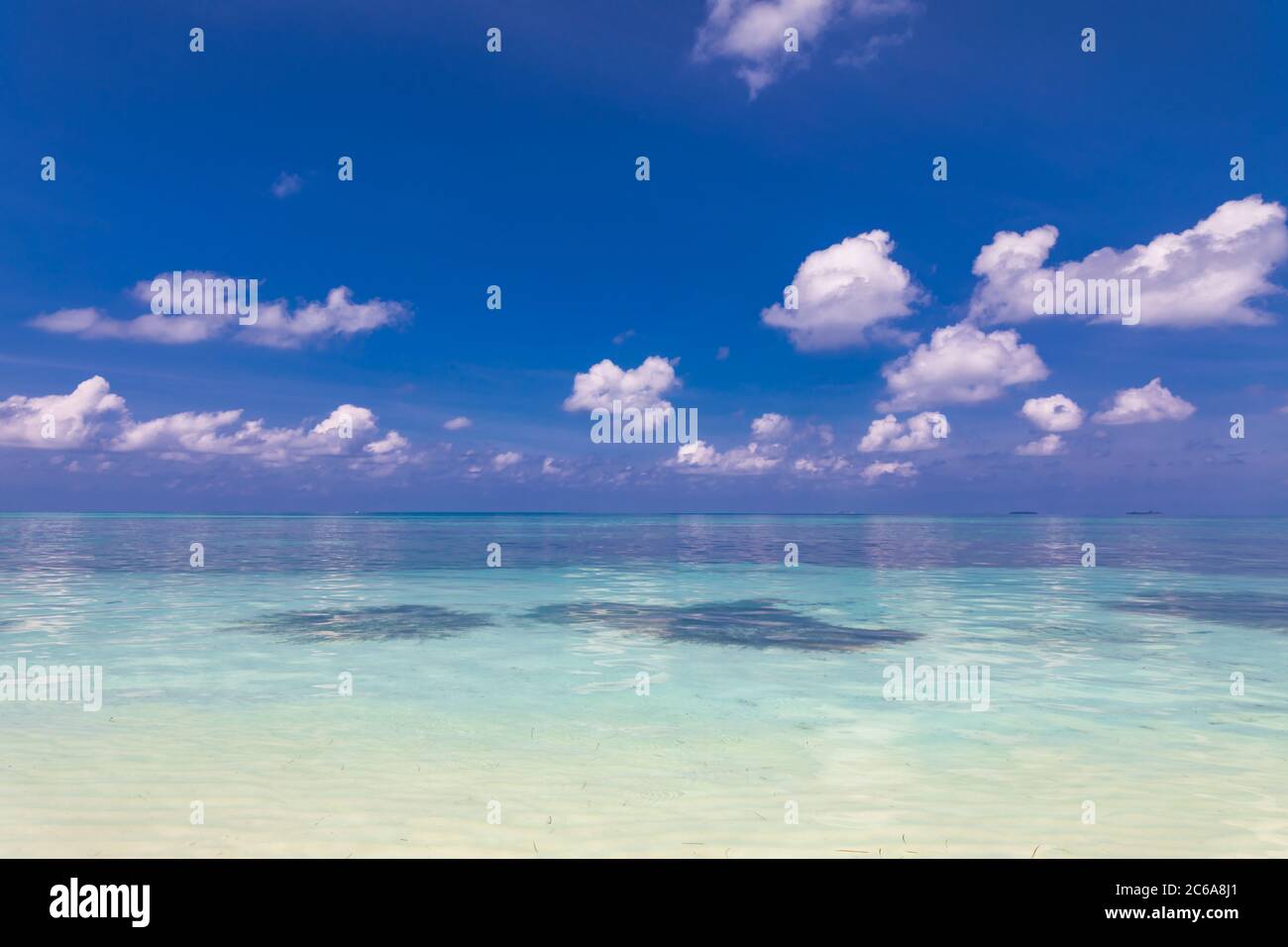 Blue waves lagoon, endless sea ocean water under blue sky with clouds ...