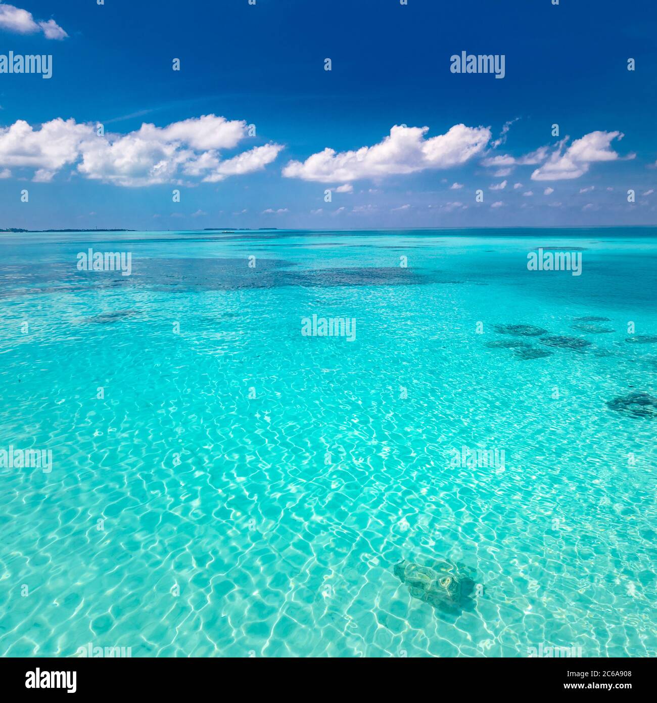 Blue waves lagoon, endless sea ocean water under blue sky with clouds ...
