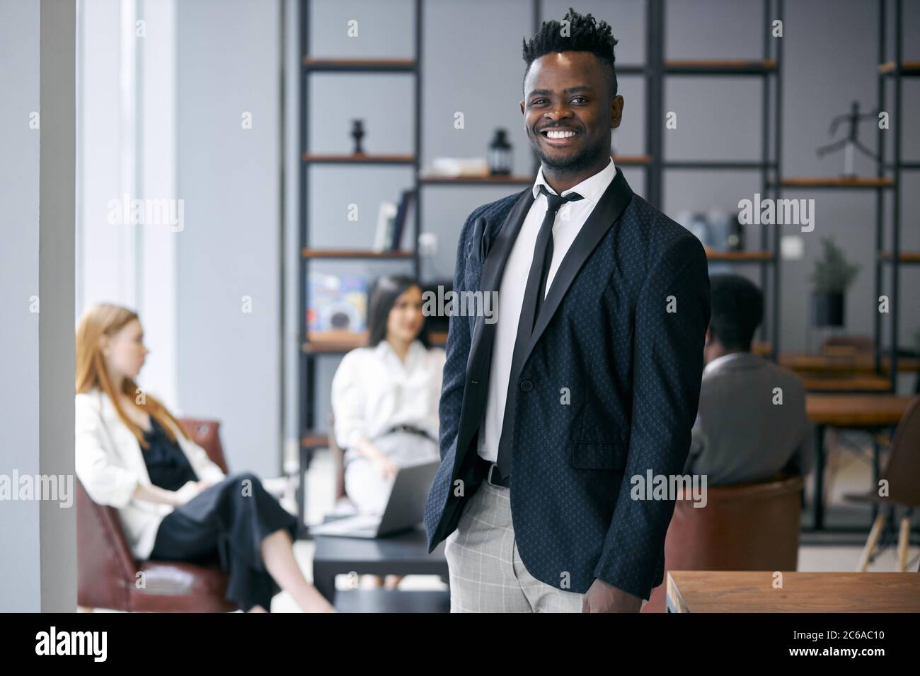 Personable businessman wearing formal black tuxedo stand posing in ...