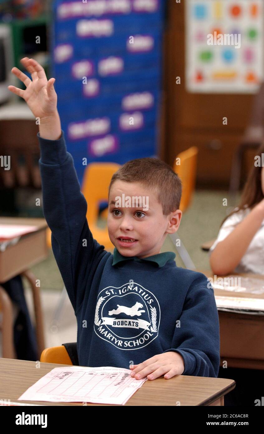 Austin, TX November 25, 2003: Enthusiastic second grader at Catholic ... Austin, TX November 25, 2003: Enthusiastic second grader at Catholic ...