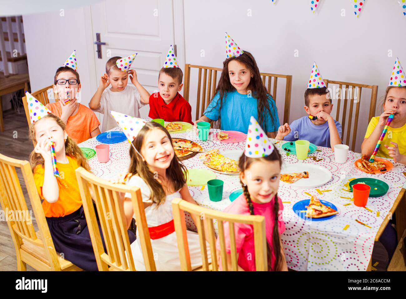 The cheerful preschool kids celebrate birthday together Stock Photo - Alamy