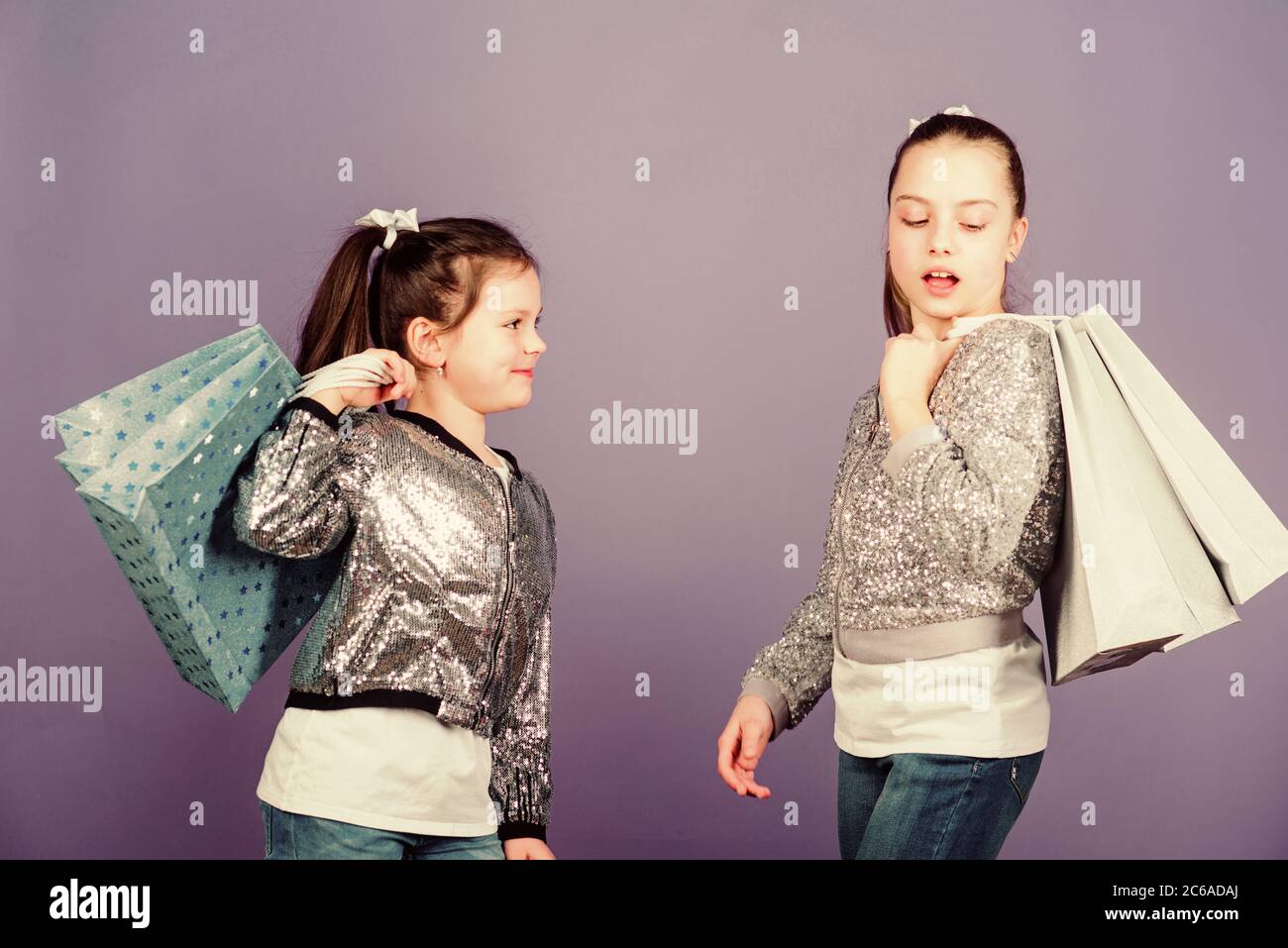 Sale and discount. Shopping day. Children hold bunch packages. Kids ...