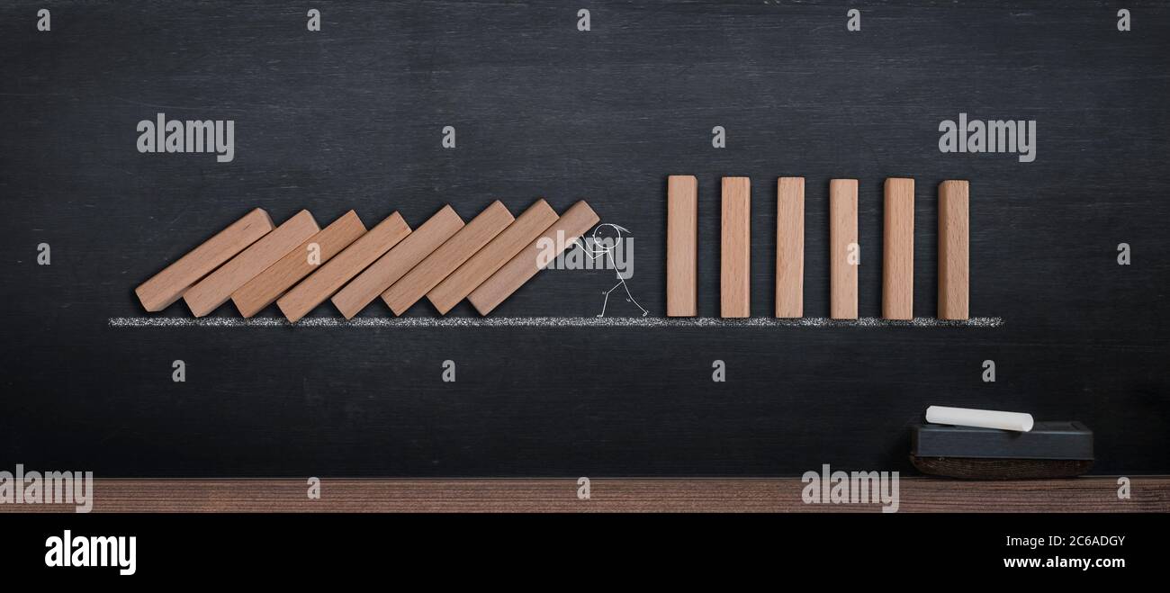 Businessman stops the chain reaction by touching it. Risk management ...