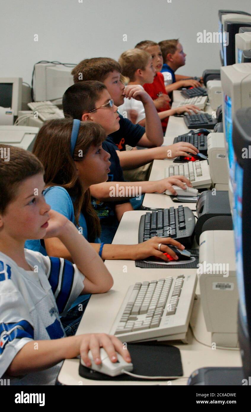 Children using hand eye coordination hi-res stock photography and ...