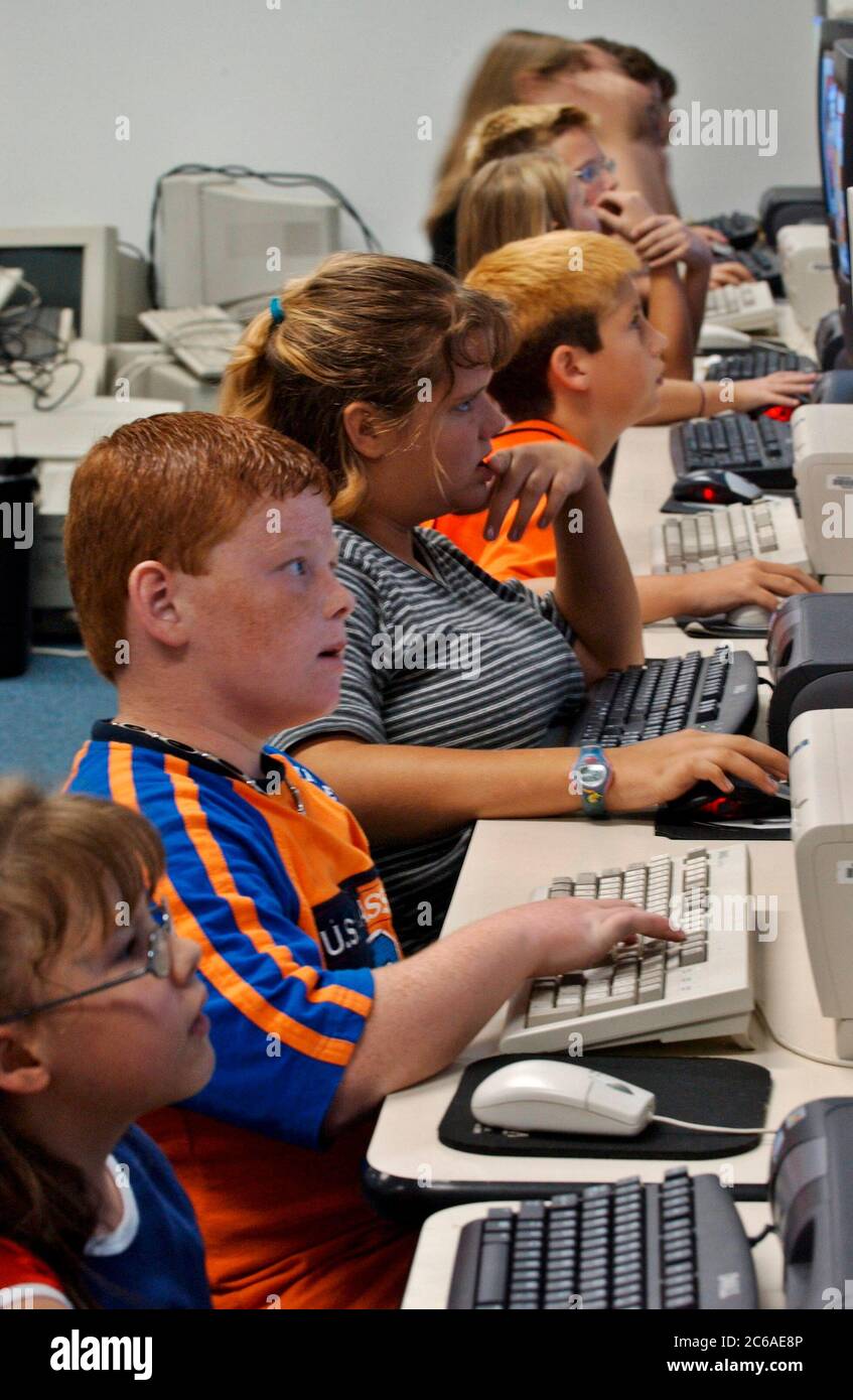 Bank of computers in elementary classroom hi-res stock photography and ...
