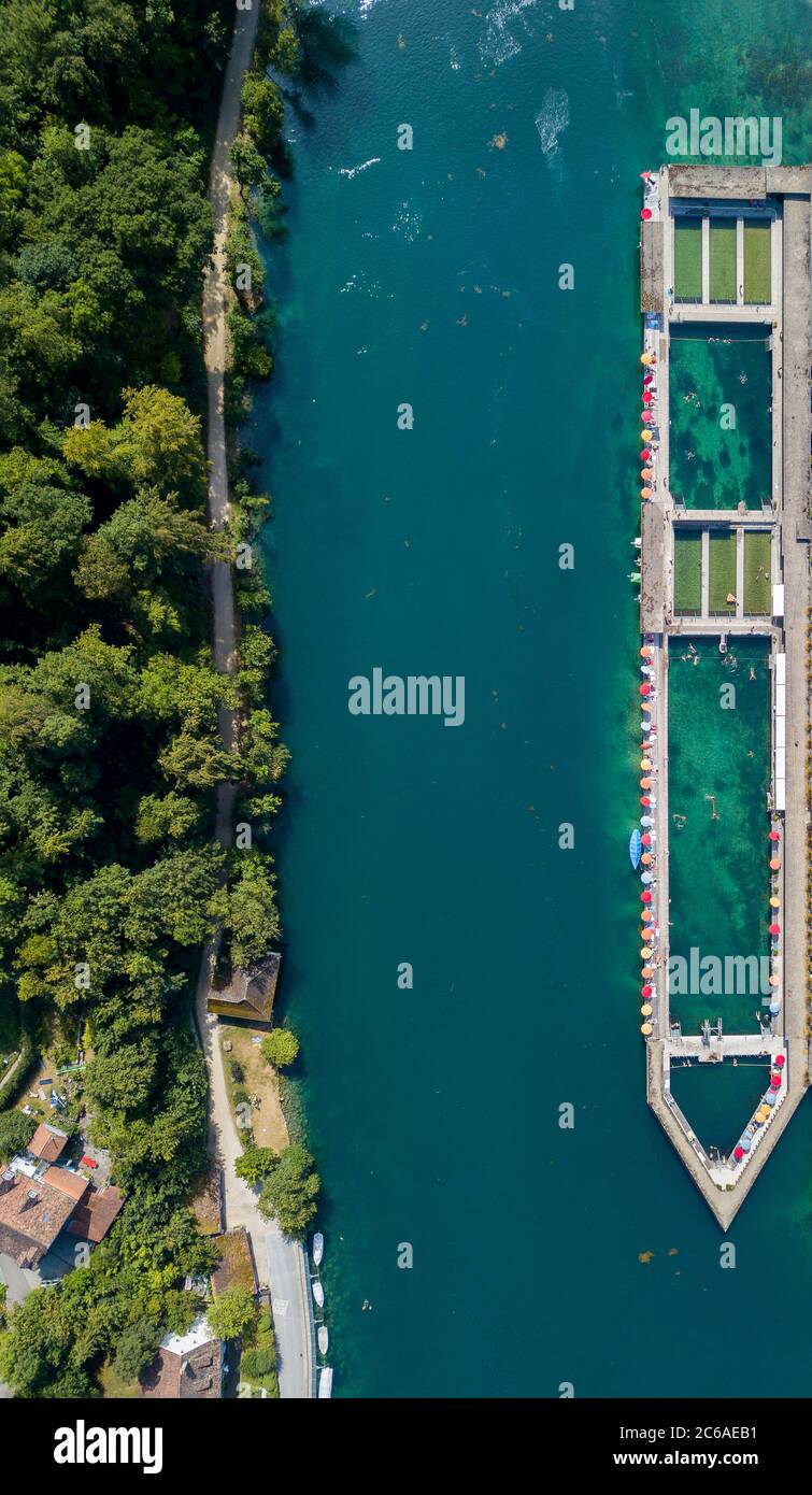 Drone image of the public swimming pool in the nature water on the ...