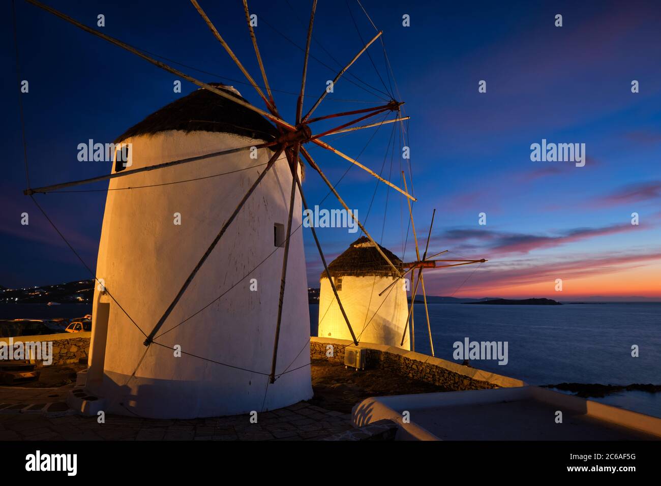 Traditional greek windmills on Mykonos island at sunrise, Cyclades ...