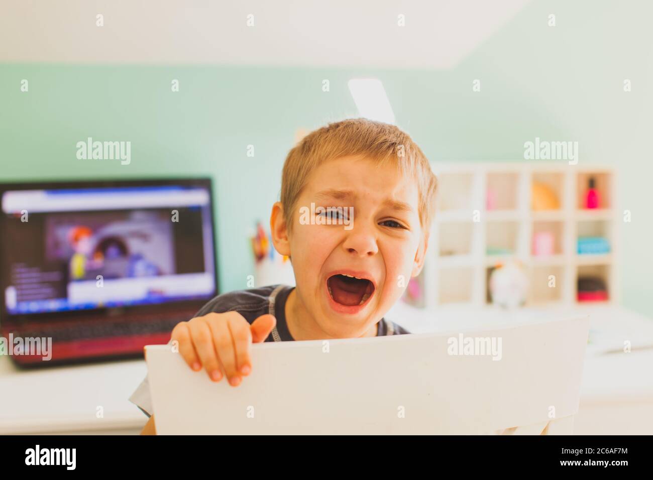 Boy crying computer hi-res stock photography and images - Alamy