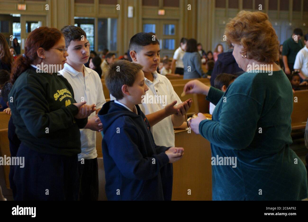 Receiving communion at mass hi-res stock photography and images - Alamy