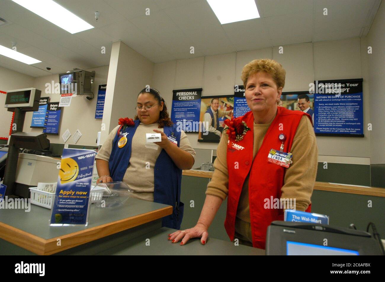 San Antonio, Texas USA, January 21, 2004: Female employees staff the ...