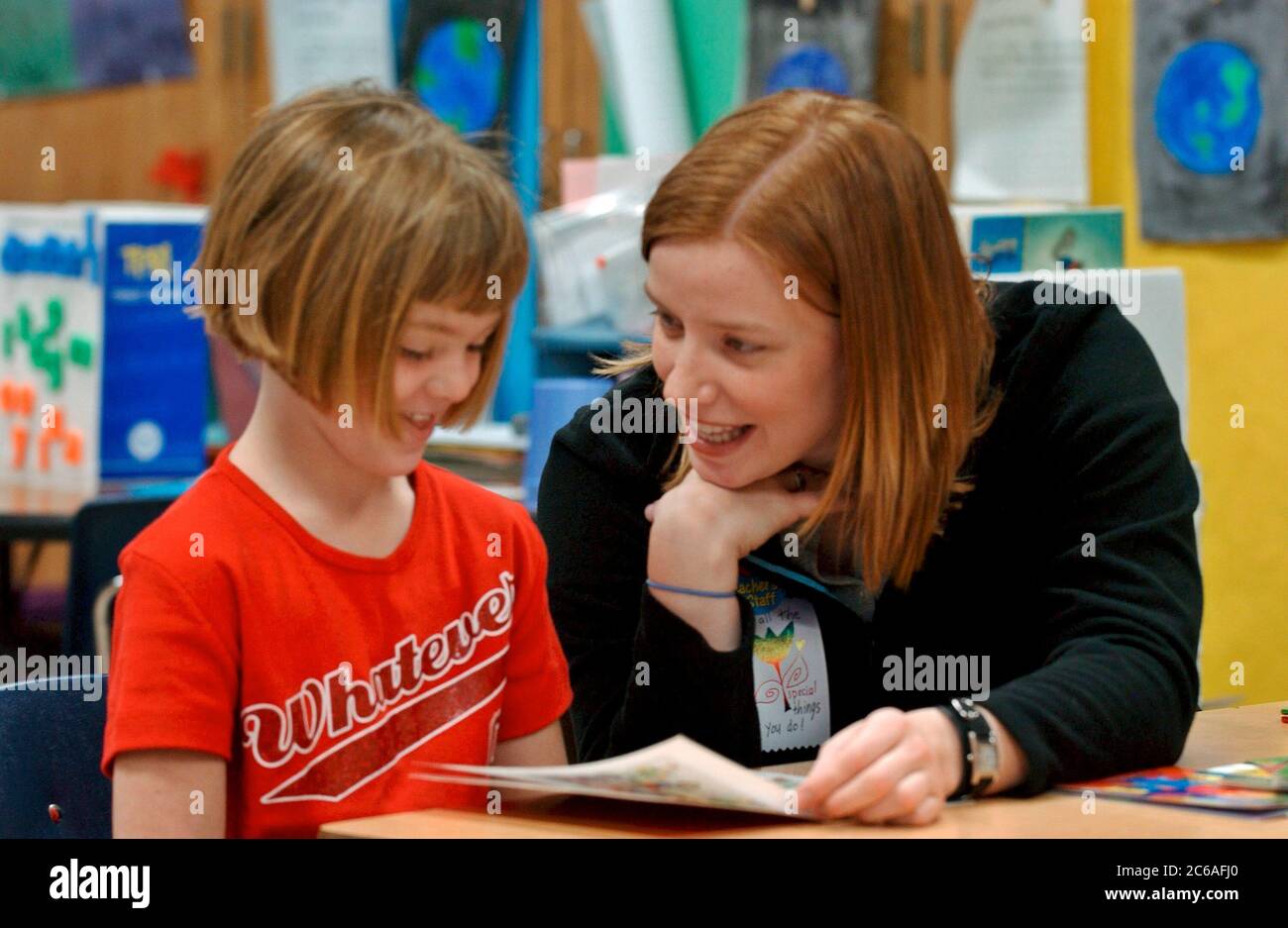 Austin, Texas USA, May 3 2004:: Female student teacher works with first ...