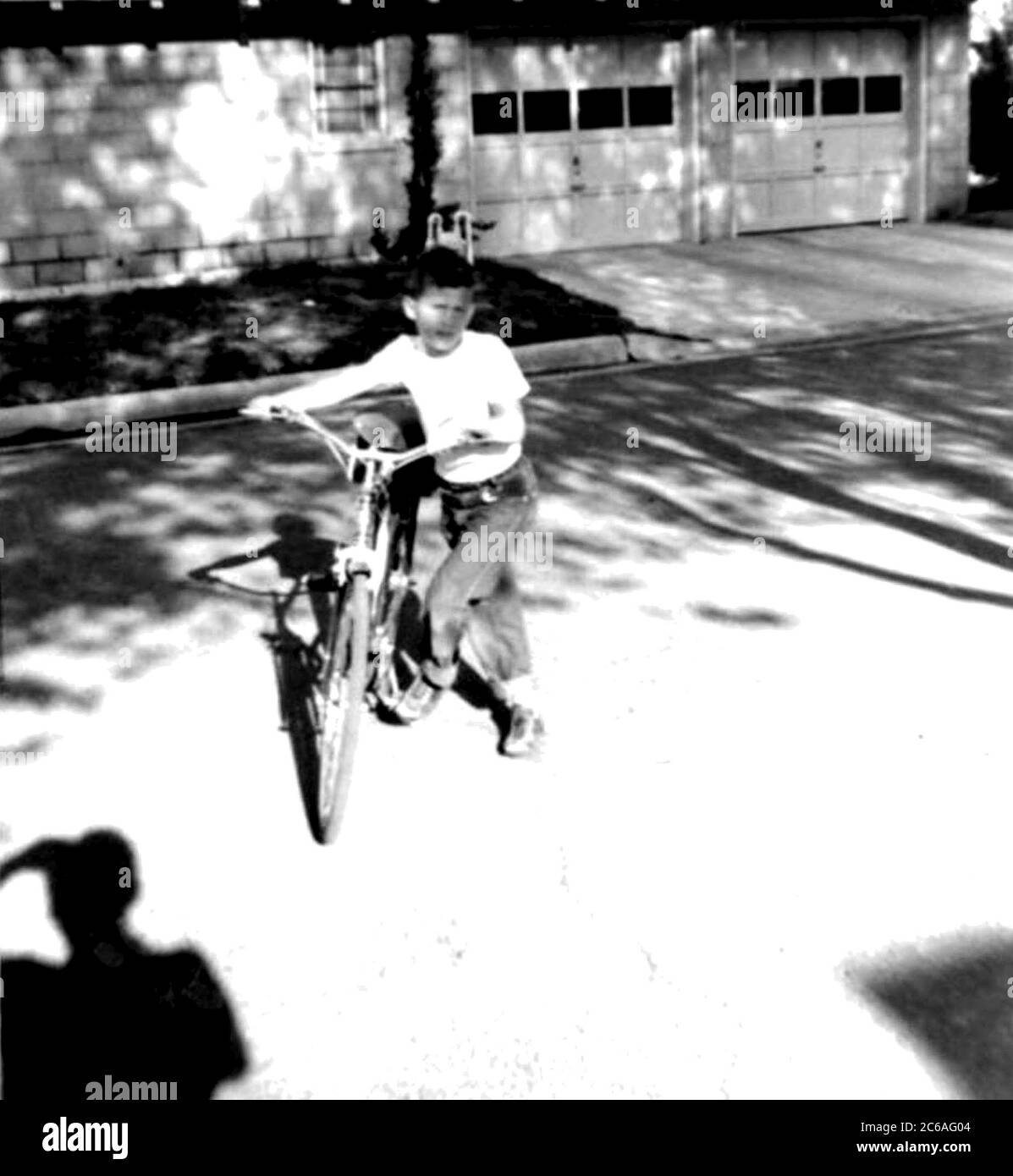 HS584 George W. Bush with his English Racer bicycle, Midland, Texas USA ...