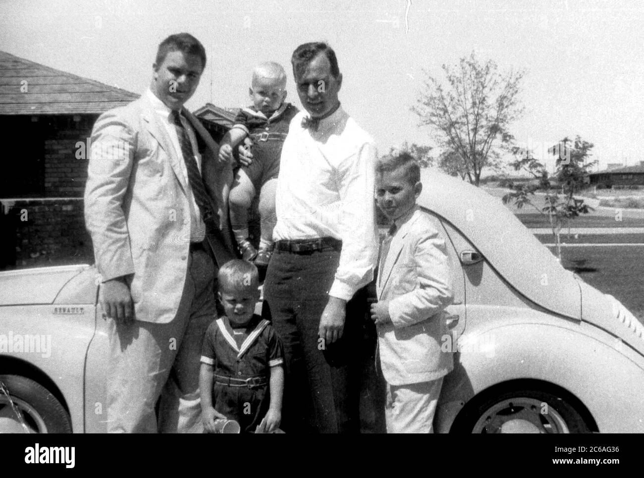 HS217 Left to right, William "Bucky" Bush, his brother George H. W ...