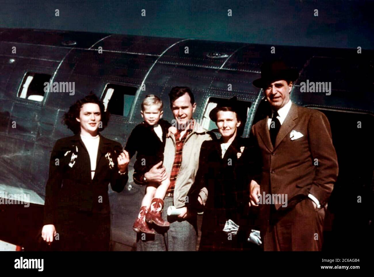 Odessa, Texas: George W. Bush, wearing cowboy boots, with his mother ...