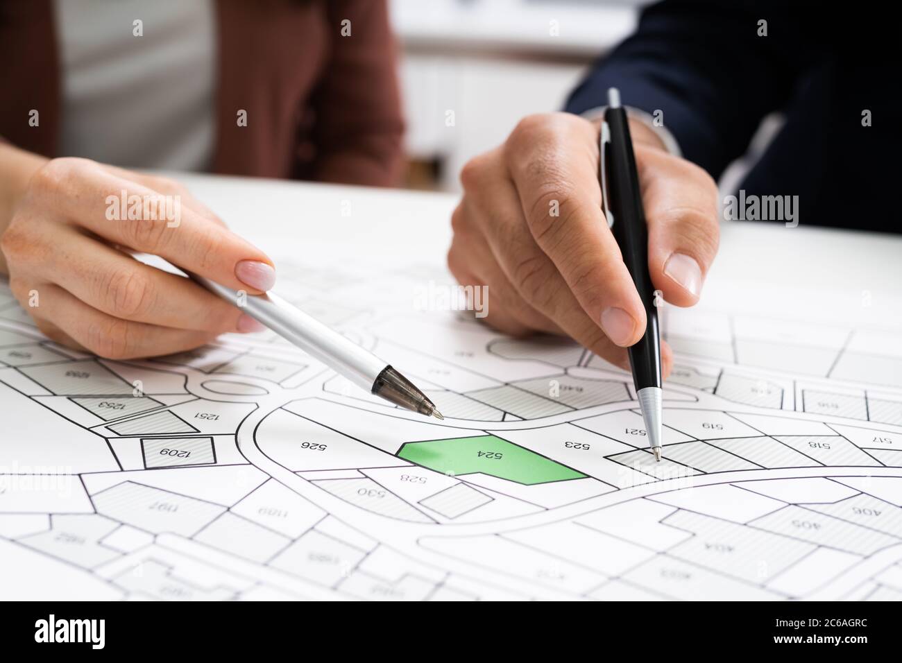 Cadastre Land Map. Cartographer Locating Building Plot Stock Photo - Alamy