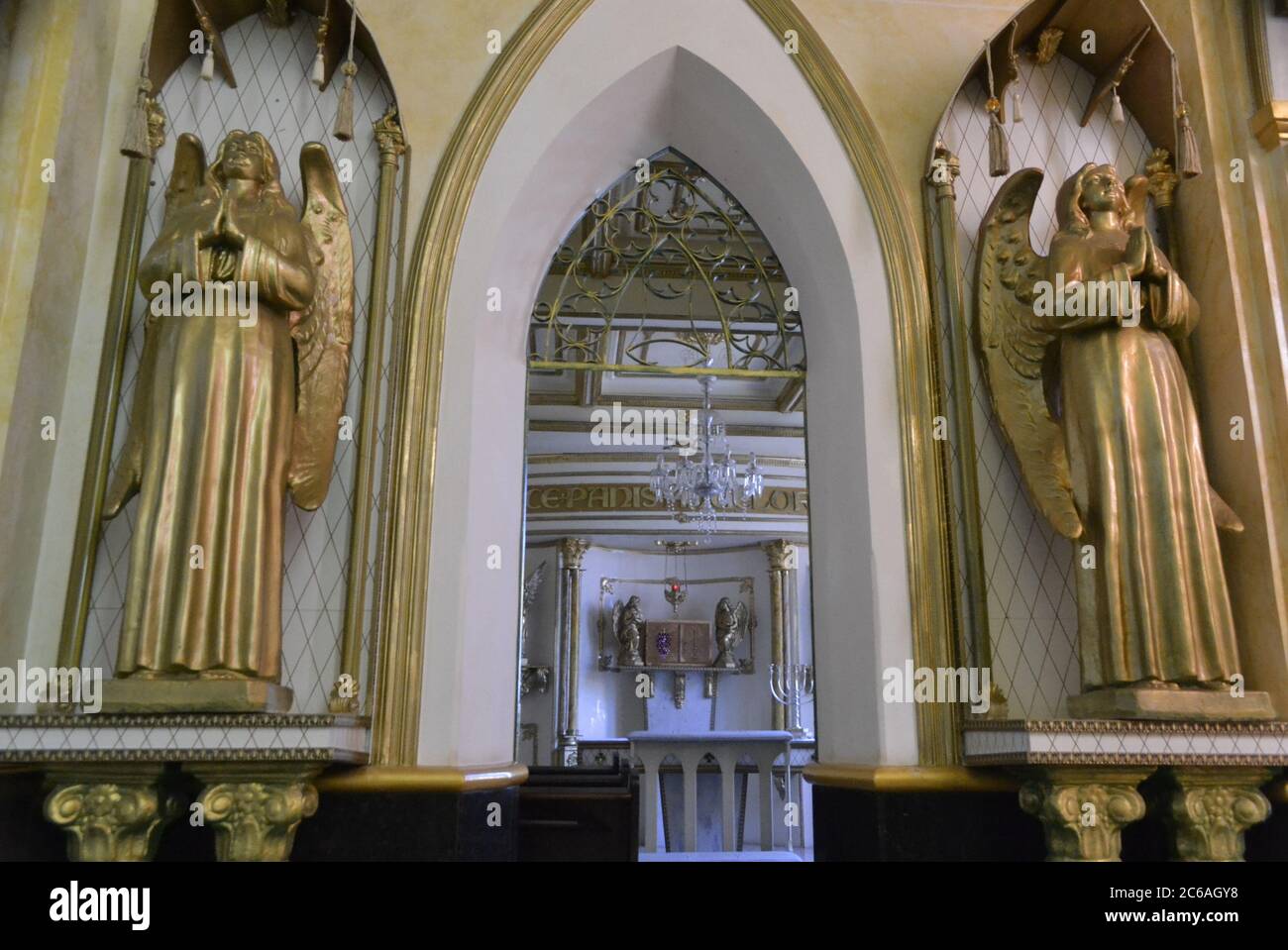 Guardian Angels, at the entrance of a prayer room, in a Catholic church ...