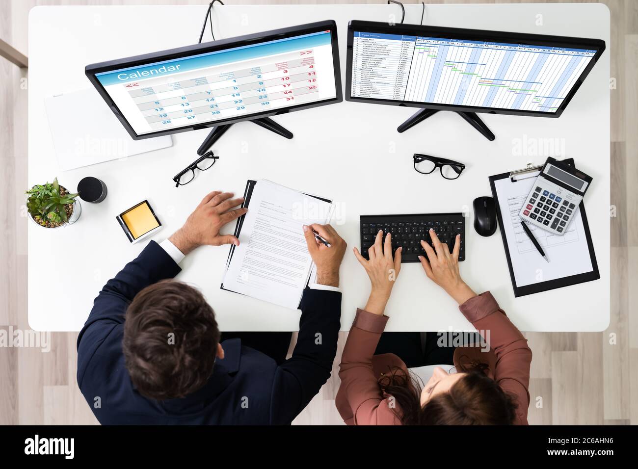 Business Schedule And Calendar Planner Using Computer In Office Stock ...