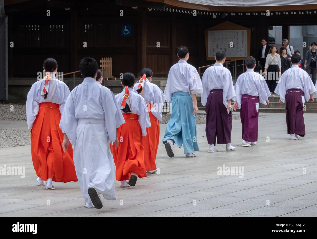 Temple priests in traditional clothing at Meiji Jingu Shinto shrine ...