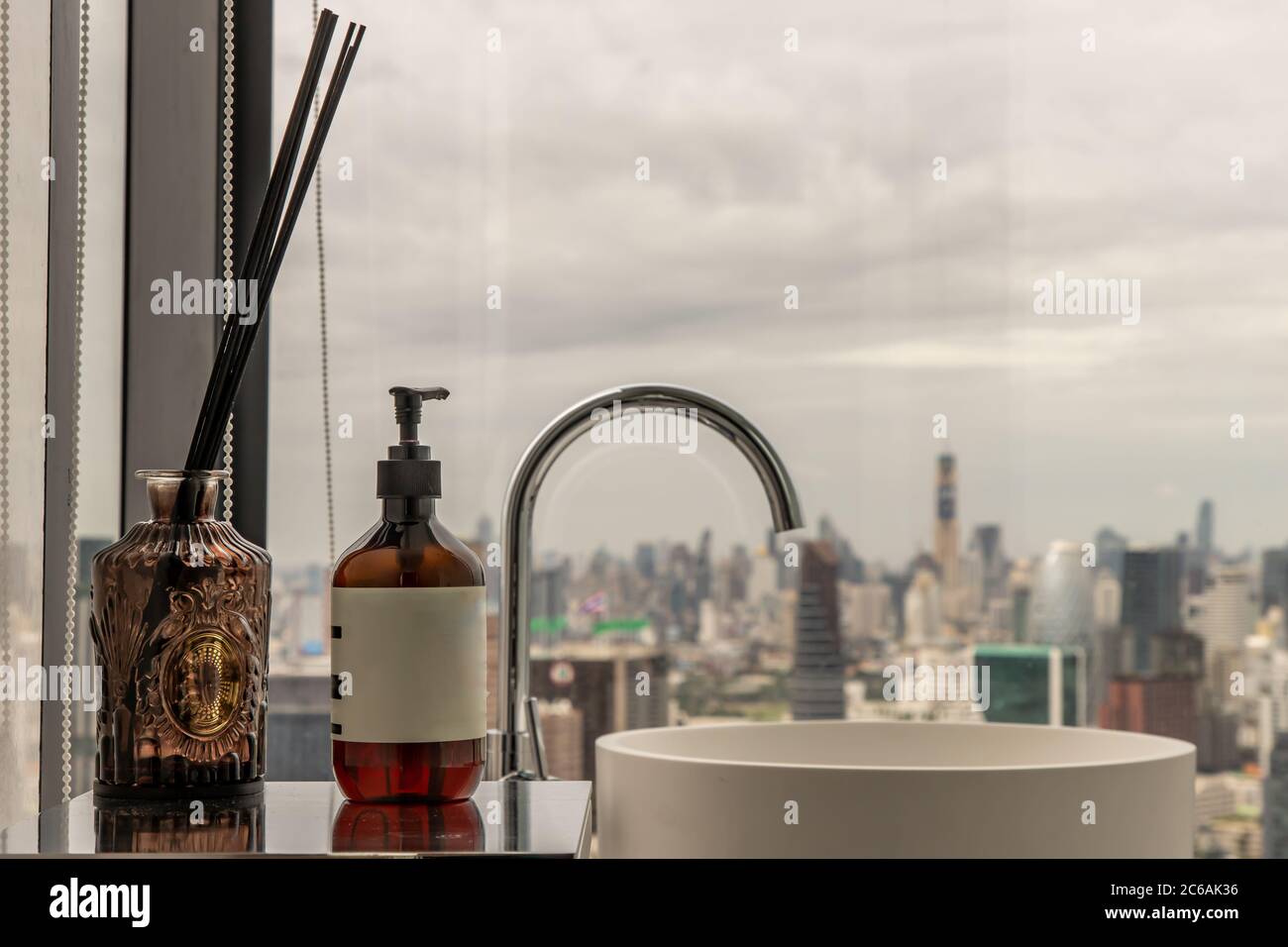 Sky view from rooftop restroom. Interior architecture with cityscape ...