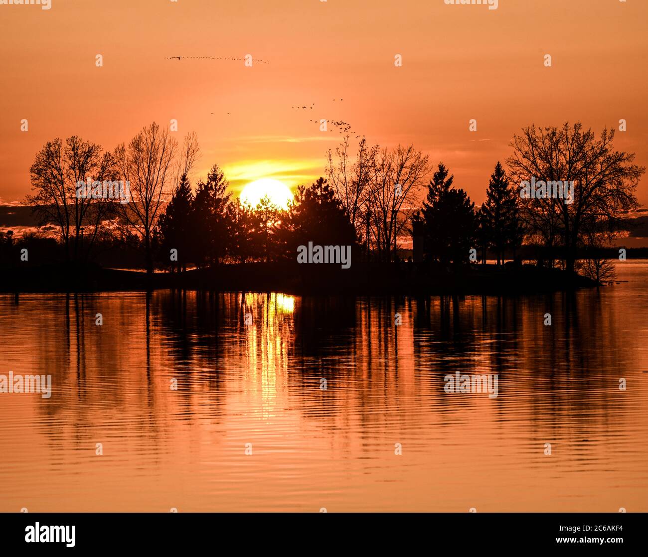sunset on the river Stock Photo - Alamy