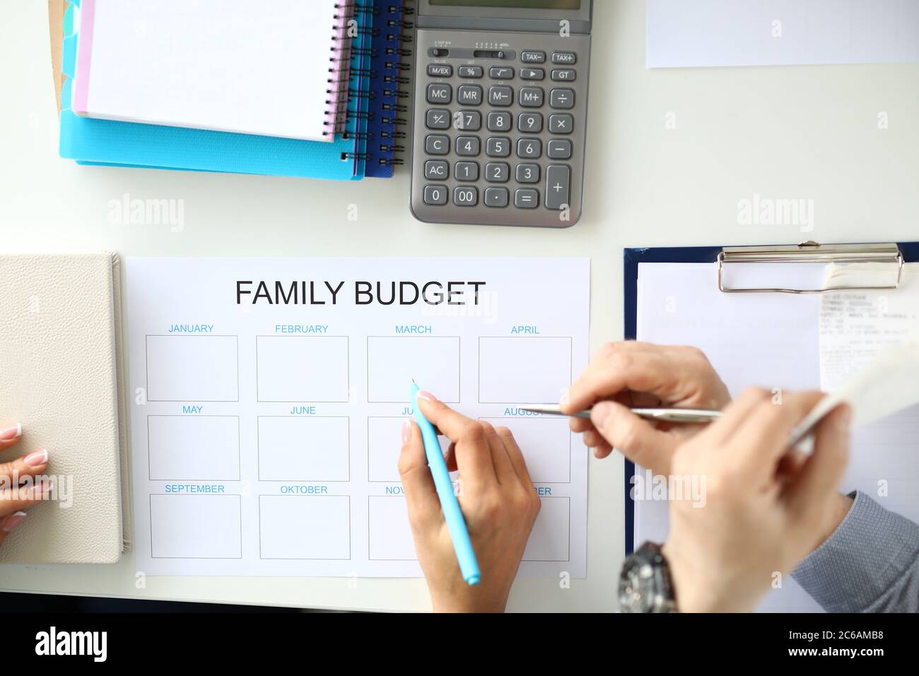 Family income and expenses budget planning Stock Photo - Alamy