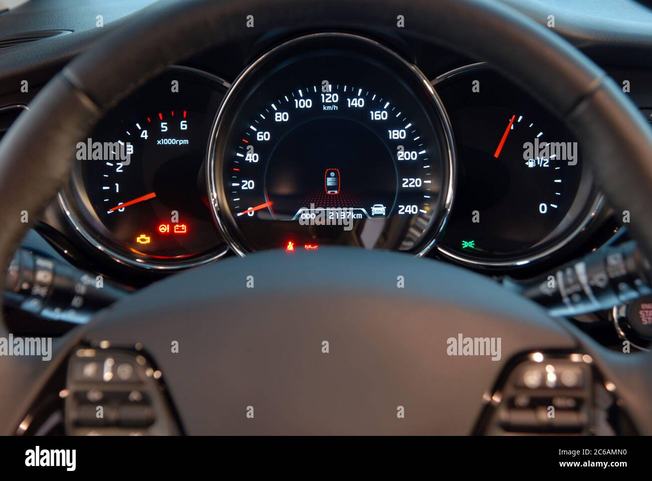 Modern car illuminated dashboard closeup Stock Photo - Alamy