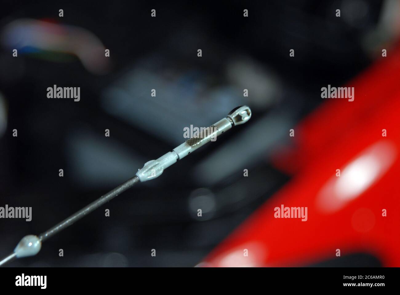 Check the oil level, Top rods to control the engine oil Stock Photo - Alamy