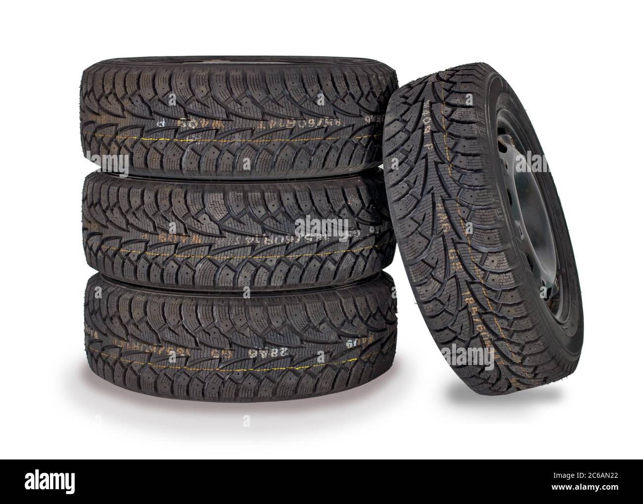 four winter tires isolated on white background Stock Photo - Alamy