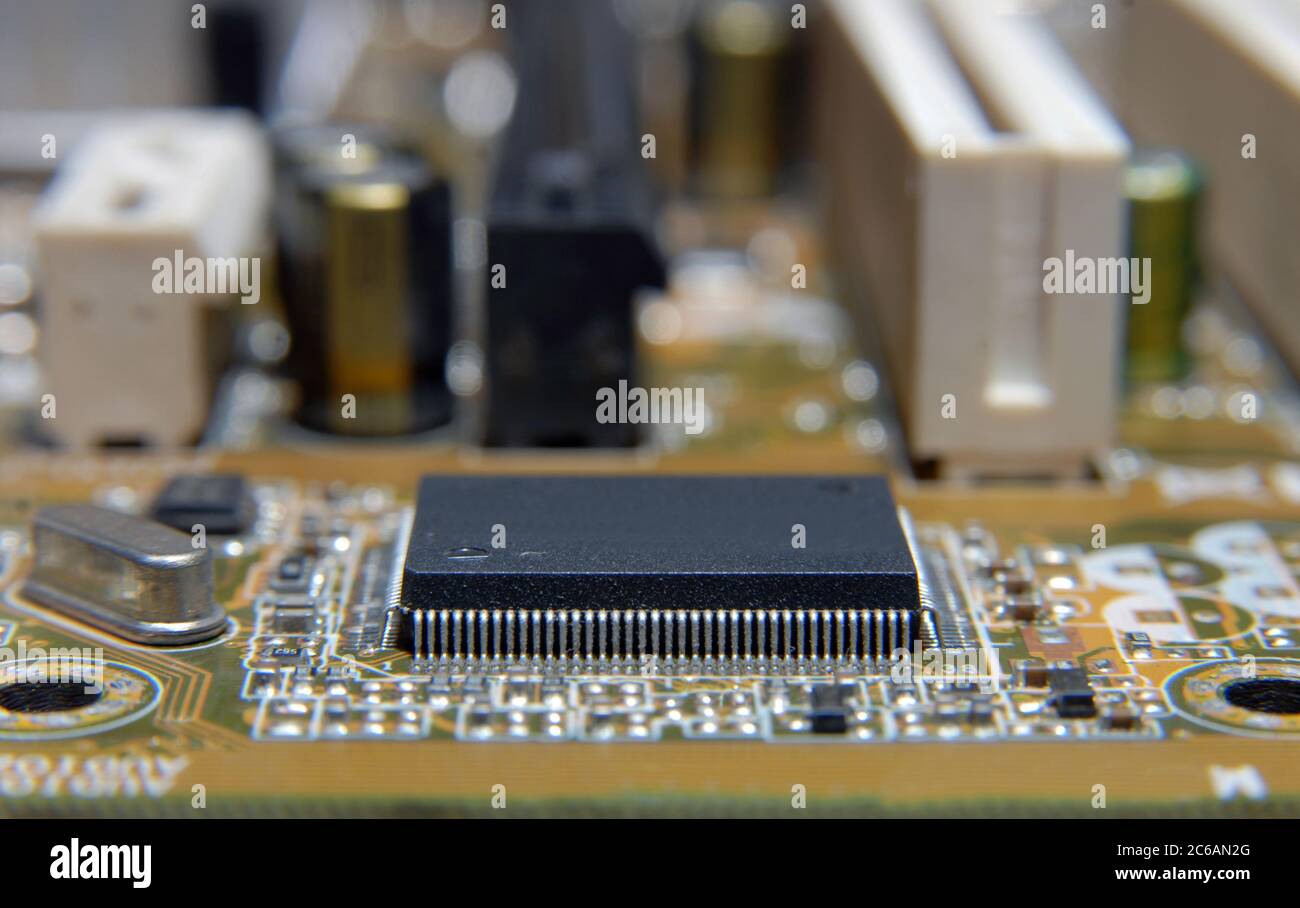 Electronic chip on circuit board Stock Photo - Alamy