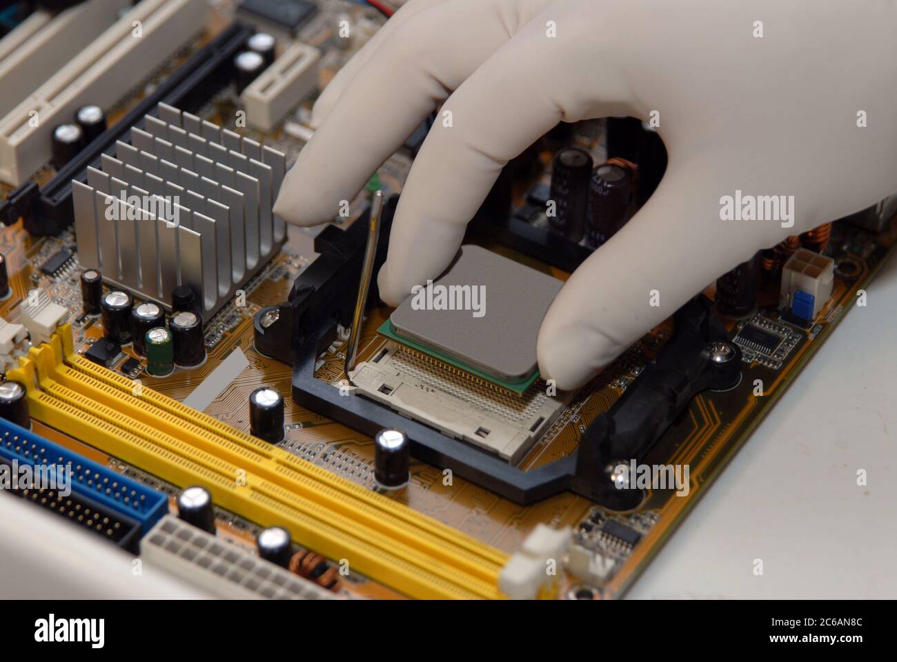 installing Central processor Stock Photo - Alamy
