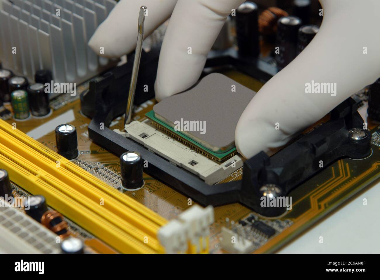 installing Central processor Stock Photo - Alamy